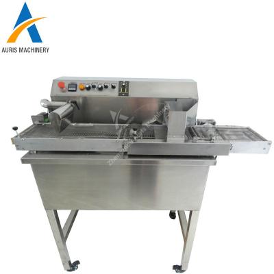 China Nuts Tempering Chocolate Making Machine 150kg Per Hour Snack Enrobing Machine for sale