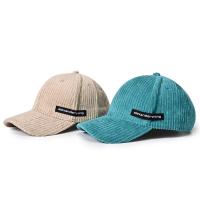 China Custom Corduroy Baseball Cap 60cm Winter Fabric Blue Color for Outdoor Sports for sale