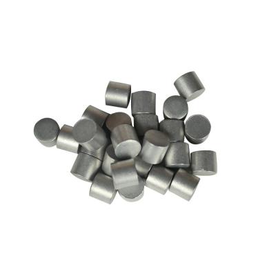 China 1070 Flat Domed Tumbling and Sandblasting Aluminum Particle with Customized Hole for sale