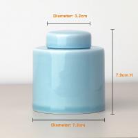 China Glossy Finish Sky Blue Ceramic Storage Jar With Lid Modern Design for sale
