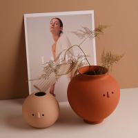 China Sculptural Ceramic Face Vase for Minimalist Interiors for sale