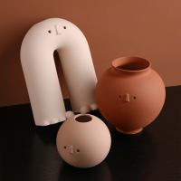 China Sculptural Ceramic Face Vase for Minimalist Interiors for sale