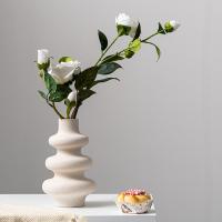 China Matte Ceramic Vase with Layered Curve Design for sale