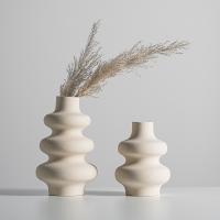 China Matte Ceramic Vase with Layered Curve Design for sale