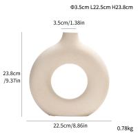 China Sculptural Round Cut Out Vase for Shelf Styling for sale