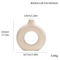 China Sculptural Round Cut Out Vase for Shelf Styling for sale