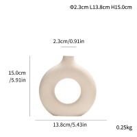 China Sculptural Round Cut Out Vase for Shelf Styling for sale