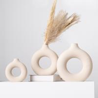 China Sculptural Round Cut Out Vase for Shelf Styling for sale