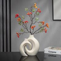 China Embrace Hollow Ceramic Vase for Modern Home Decor for sale