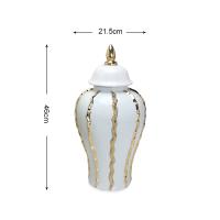 China Elegant Ceramic Covered Jar with Gold Lines for sale