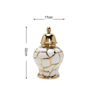 China Elegant Ceramic Covered Jar with Gold Lines for sale