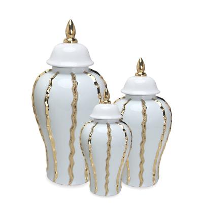 China Elegant Ceramic Covered Jar with Gold Lines for sale