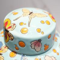 China Decorative Ceramic Funeral Urn with Butterfly Design for sale