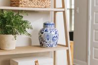 China Blue and White Ceramic Cremation Urn with Floral Pattern for sale