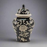 China Black Ceramic Cremation Urn with Ivory Floral Design for sale