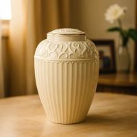 China Ivory Ceramic Cremation Urn with Embossed Design for sale
