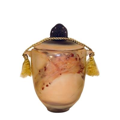 China Artistic Amber Ceramic Cremation Urn with Decorative Tassels for sale