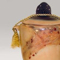 China Artistic Amber Ceramic Cremation Urn with Decorative Tassels for sale