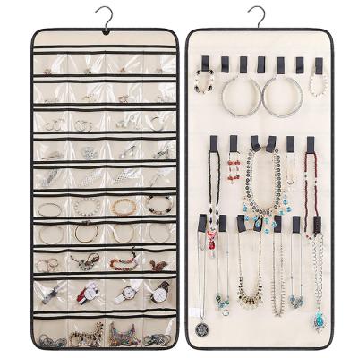 China 40 Pocket Wall Hanging Jewelry Organizer with 20 Hook Loops Closet Necklace Holder Non Woven Fabric for sale