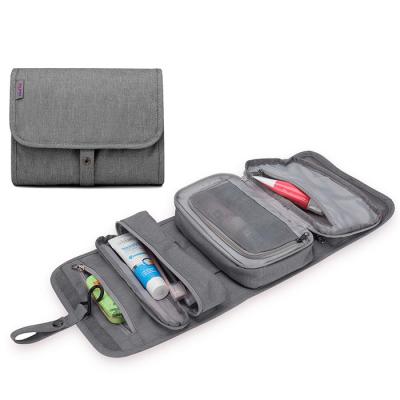 China Gray Hanging Travel Toiletry Bag Oxford Cosmetic Organizer with Metal Hook 500pcs MOQ for sale