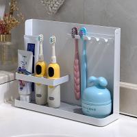 China Household Personalized Stainless Multifunction Mesa Toothpaste Dispenser Electric Toothbrush Holder Bathroom Toiletries Organize for sale