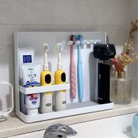 China Household Personalized Stainless Multifunction Mesa Toothpaste Dispenser Electric Toothbrush Holder Bathroom Toiletries Organize for sale