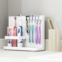 China Household Personalized Stainless Multifunction Mesa Toothpaste Dispenser Electric Toothbrush Holder Bathroom Toiletries Organize for sale