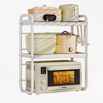 China NEW Metal Adjustable Telescopic Double Layer Microwave Oven Kitchen Multifunctional Convection Oven Rice Cooker Storage Rack for sale