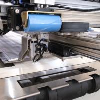 China Lihua high-speed production industrial shower curtain machine Mesin punching otomatis computer fully automatic punching machine for sale