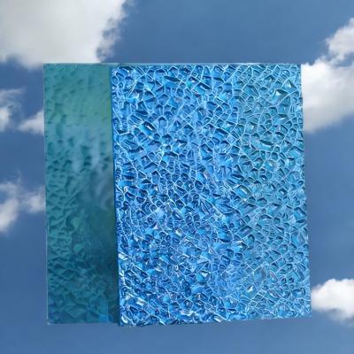 China Anti-UV Diamond Embossed Polycarbonate Sheet 2-6mm Thickness with 250x Glass Impact Resistance and 80% Light Transmission for sale