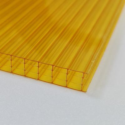 China 10mm Yellow Four Layer Polycarbonate Hollow Sheet UV Protection Impact Resistance 2100mm Width for sale