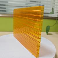 China Orange Polycarbonate Hollow Sheet 6mm 2100mm Twin Wall UV Protected Roofing Panel for sale