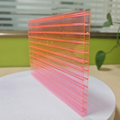 China Pink Polycarbonate Hollow Sheet 6mm 2100mm UV Coated Lightweight Roofing Panel for sale