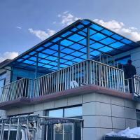 China Aluminum Frame Blue Polycarbonate Solid Sheet Roofing Awning 2.0mm 1000mm Width for Homes Commercial Buildings for sale