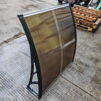 China Split Panel Polycarbonate Awning 5mm Plastic Frame for Doors Windows UV Protection for sale