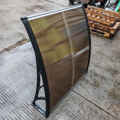 China Split Panel Polycarbonate Awning 5mm Plastic Frame for Doors Windows UV Protection for sale