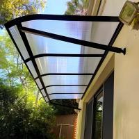 China TOPPC Twin Wall Polycarbonate Hollow Sheet 6mm B1 Fire Rated Clear Anti UV Awning Canopy Roofing for sale