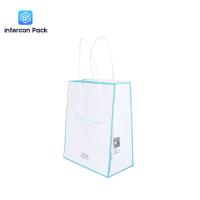 China 120gsm White Flat Bottom Paper Bags Bioldegradable Shopping Paper Bags With Logo for sale