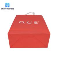 China 210g Twisted Handle Kraft Paper Bags Red Color Printing 12.99x8.66x3.94 inch for sale