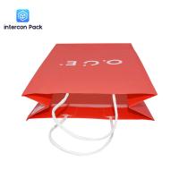 China 210g Twisted Handle Kraft Paper Bags Red Color Printing 12.99x8.66x3.94 inch for sale