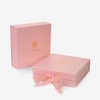 China Pink Magnetic C1S C2S Foldable Packaging Box With Ribbon Closure for sale