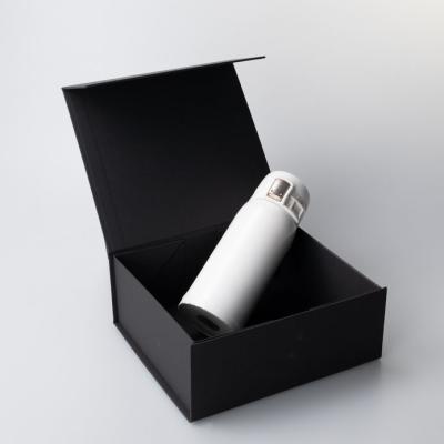 China 157gsm Art Paper Black Gift Box With Lid Foldable Rigid Magnetic Packaging for sale