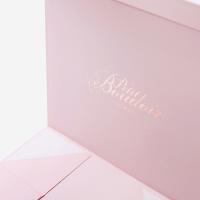 China Book Shape Debossing Magnetic Garment Packaging Boxes With Ribbon for sale
