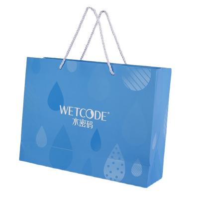 China Matt Logo Common 28*15*28cm Printable Paper Bags Gift Packaging for sale