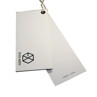 China Debossed Logo 350g Kraft Paper Custom Hang Tags With String for sale