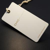 China Debossed Logo 350g Kraft Paper Custom Hang Tags With String for sale
