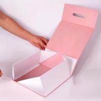 China Pink Magnetic C1S C2S Foldable Packaging Box With Ribbon Closure for sale