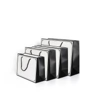 China Shopping Packaging Laminated C1S Art Paper Tote Bags Custom Logo for sale