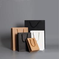 China Custom Kraft Paper Shopping Bags 300gsm Offset 4C Printable Reusable Tote for Retail Stores for sale