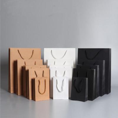 China Custom Kraft Paper Shopping Bags 300gsm Offset 4C Printable Reusable Tote for Retail Stores for sale